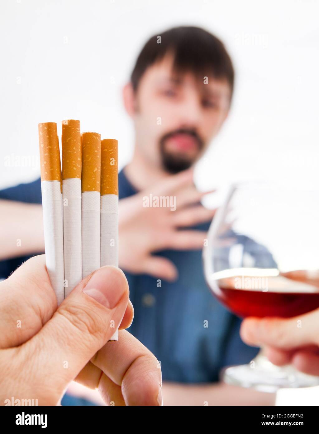 Man refuse Cigarettes and Alcohol on the White Background Stock Photo ...