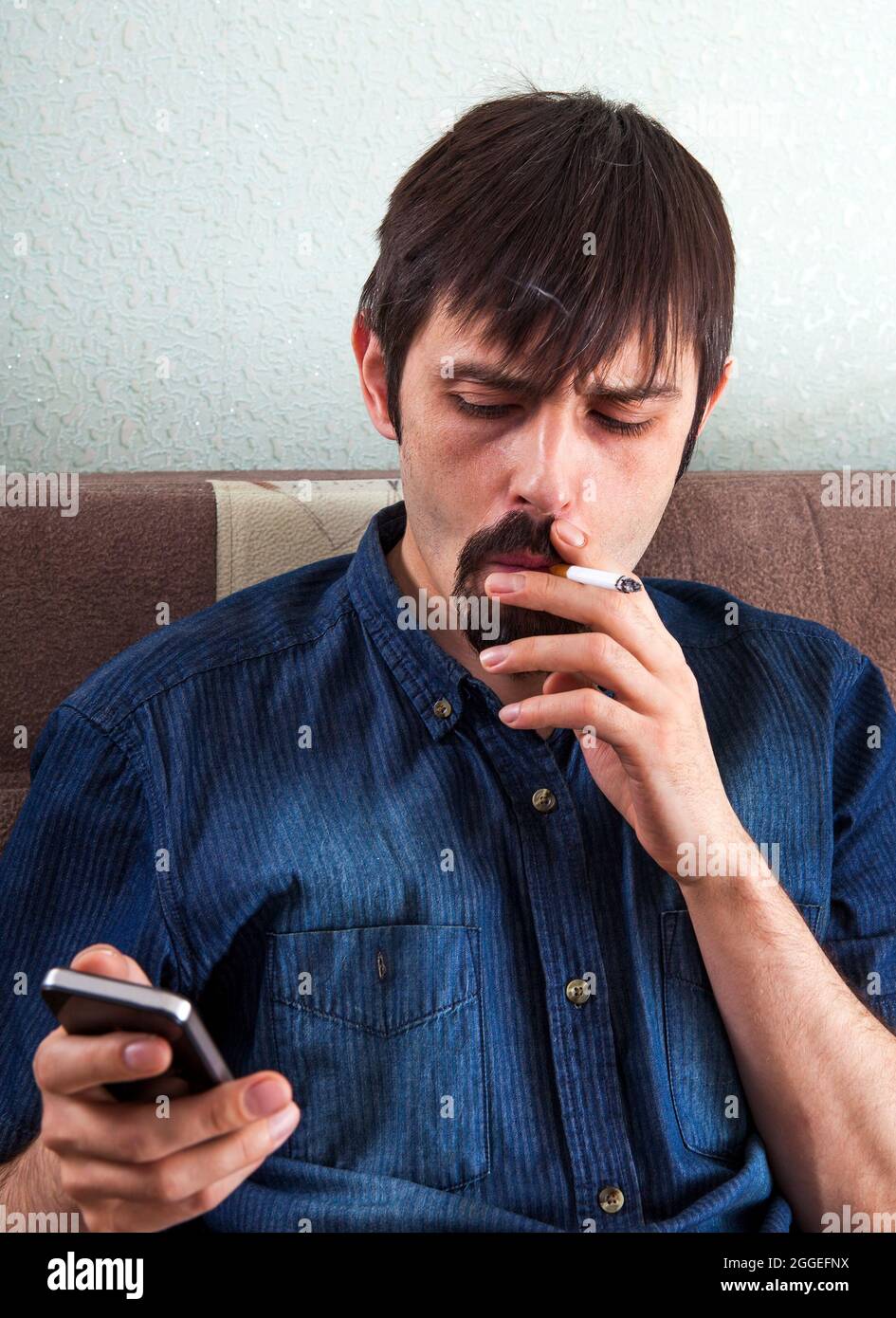 Smoker on the phone hi-res stock photography and images - Alamy