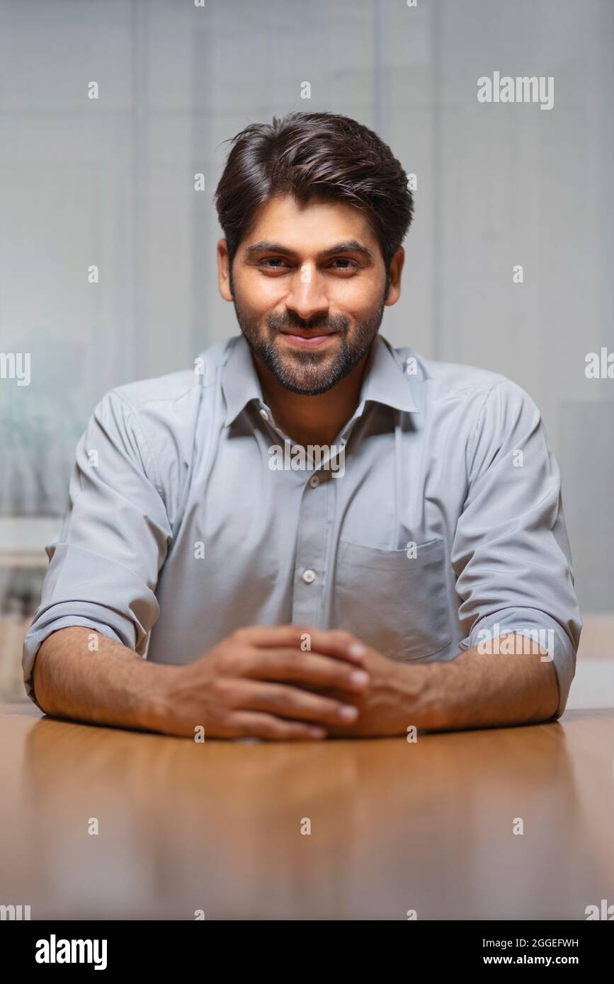 Professional sitting hi-res stock photography and images - Alamy