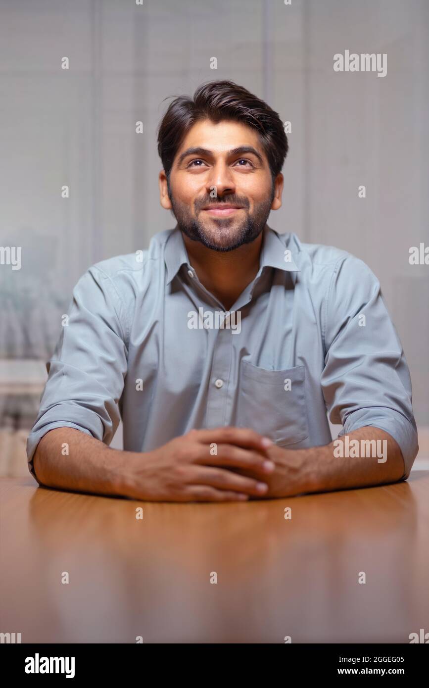 Professional sitting hi-res stock photography and images - Alamy