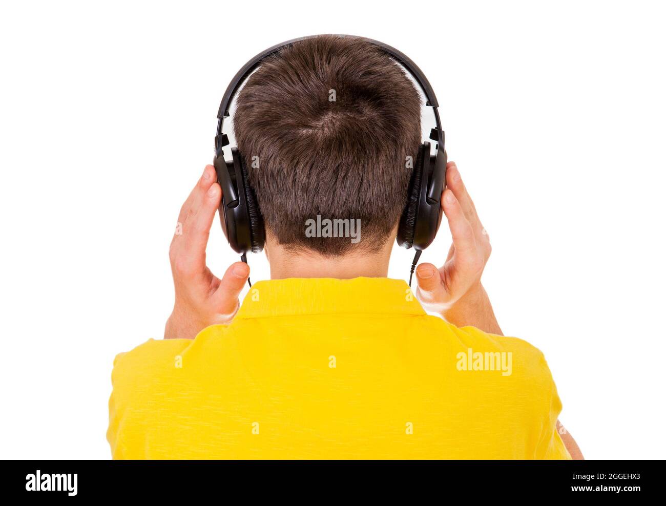 Rear View of the Young Man in Headphones on the White Background Stock ...