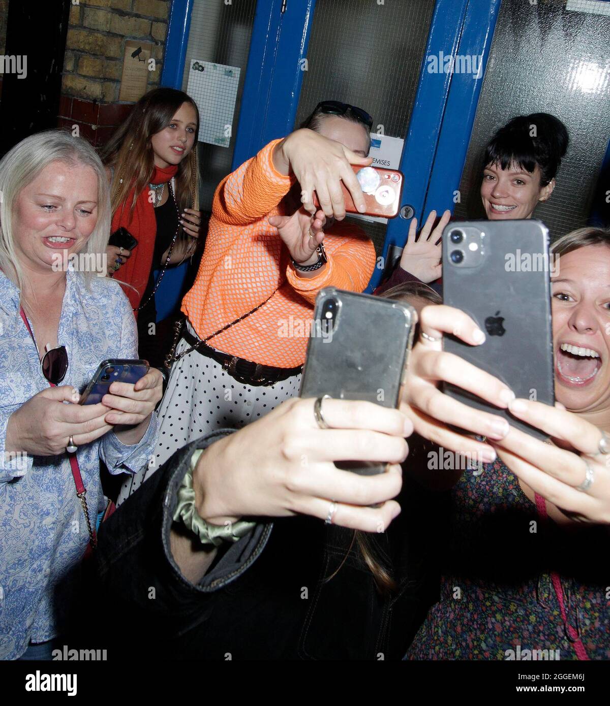 Lily Allen went out with two friends after her performance and she ...