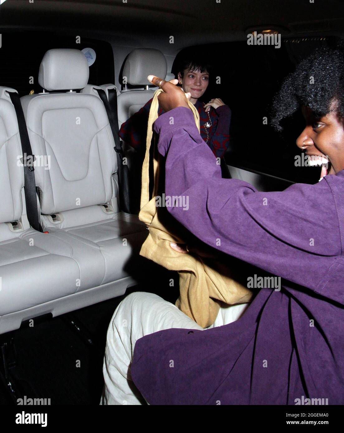 Lily Allen went out with two friends after her performance and she ...
