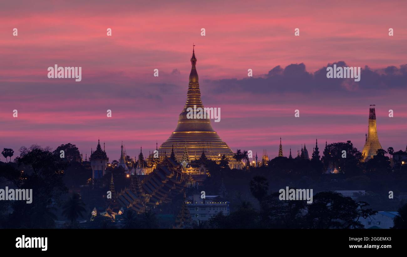 Shwedagon Temple in Yangon at sunset Stock Photo - Alamy