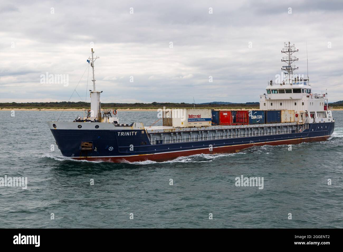 Trinity general cargo ship underway departing from Poole Harbour ...