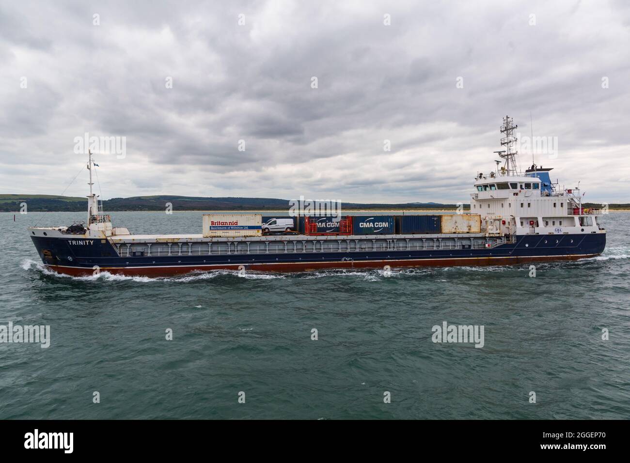 Trinity general cargo ship underway departing from Poole Harbour ...
