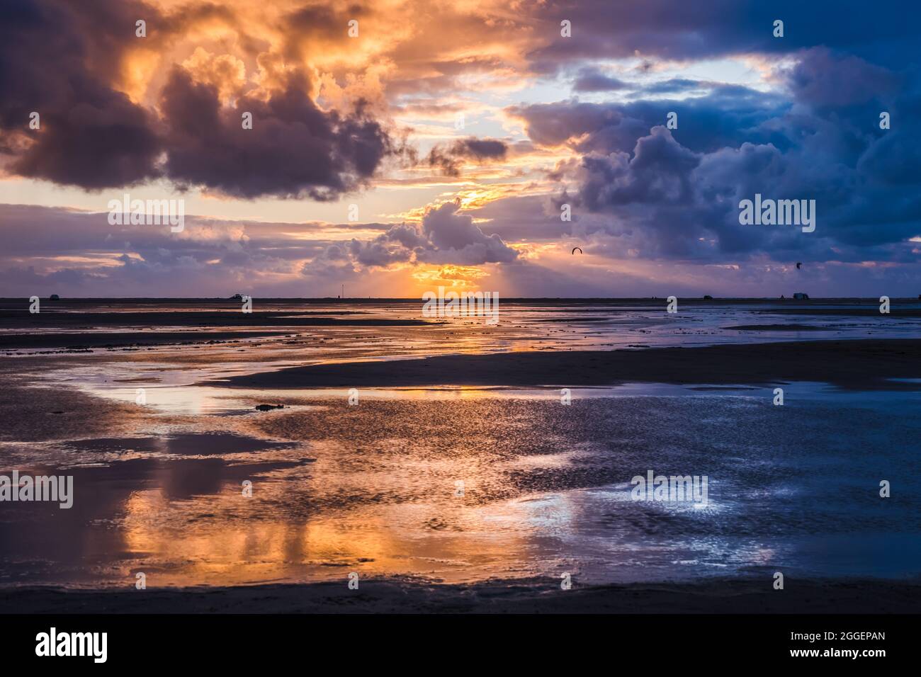 Sunset on a cloudy colorful sky over the North Sea in Denmark with high ...
