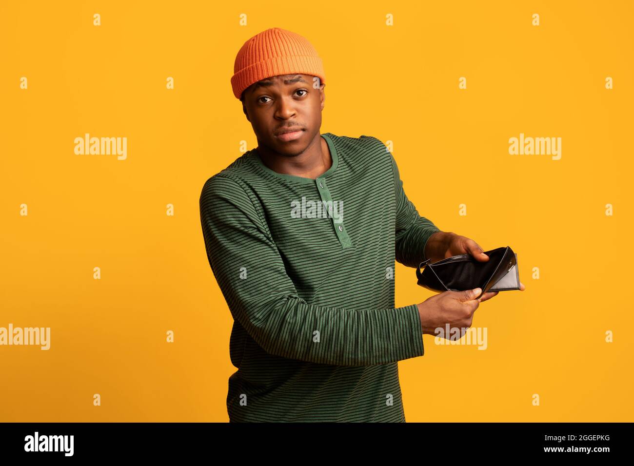 Poverty Concept. Upset Young Black Man Showing Empty Wallet At Camera, African American Guy ...