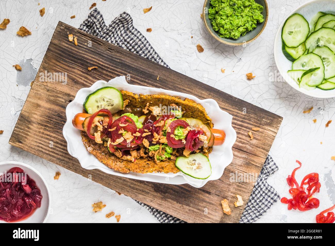 Healthy vegetarian hot dog with flatbread made from vegetables, topped ...