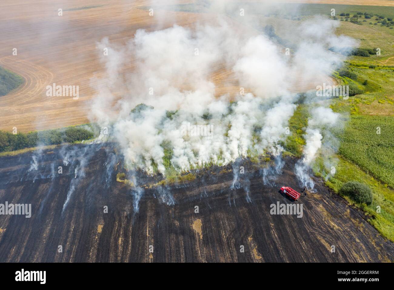 Aerial view of burning fields in a countryside Stock Photo - Alamy