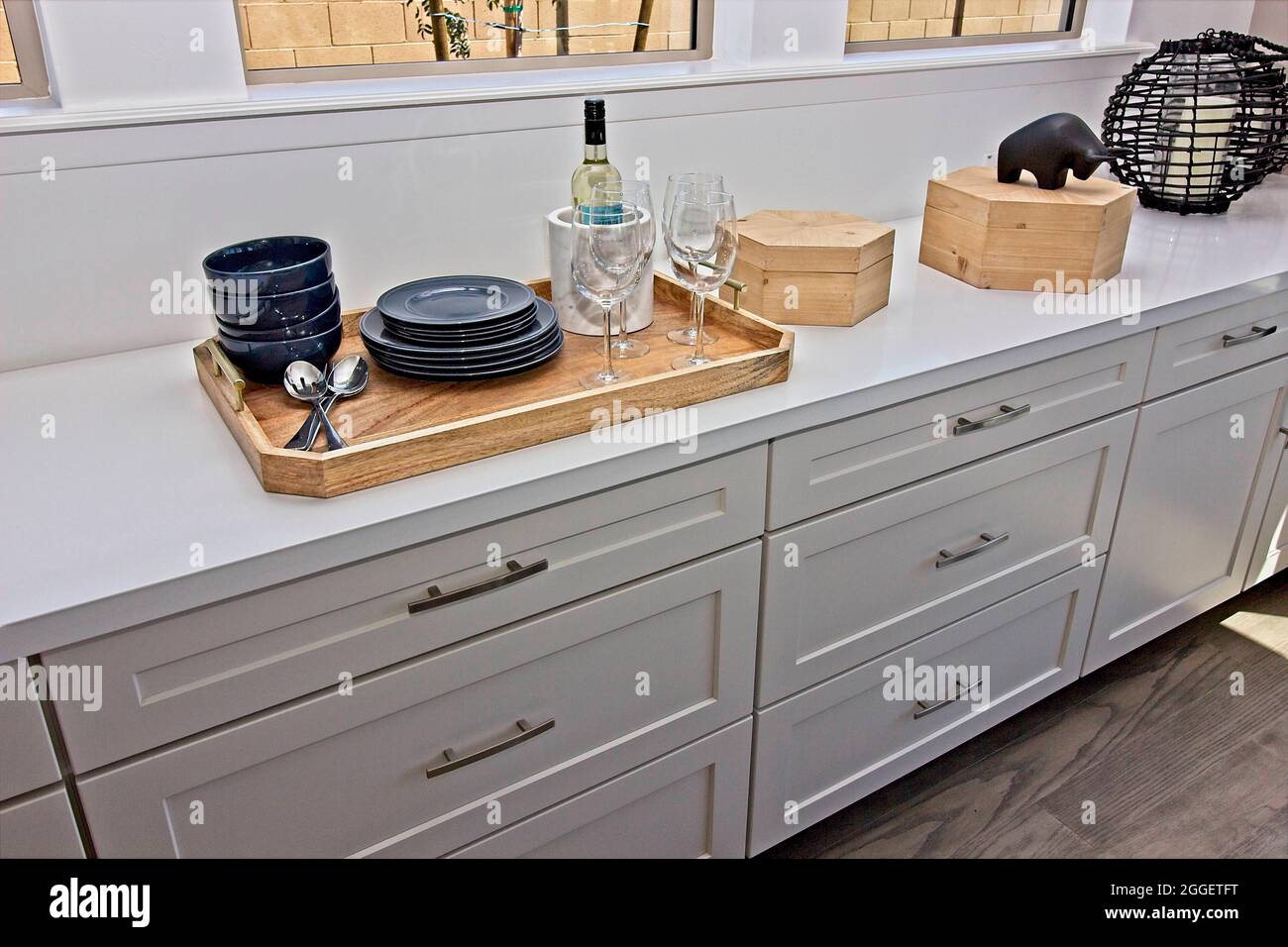 Kitchen Side Bar With Wooden Tray And Decorator Items Stock Photo - Alamy