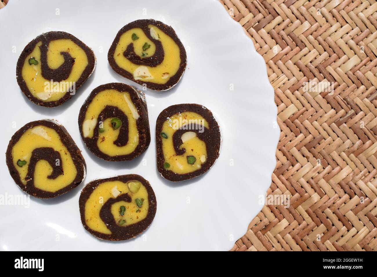 Barfi roll hi-res stock photography and images - Alamy