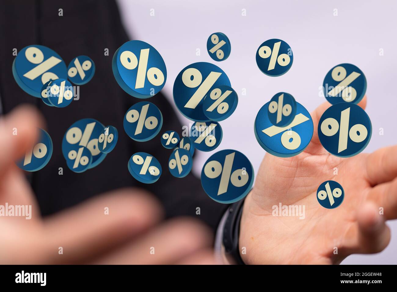 Closeup of floating 3D rendered percentage symbols in hands Stock Photo ...