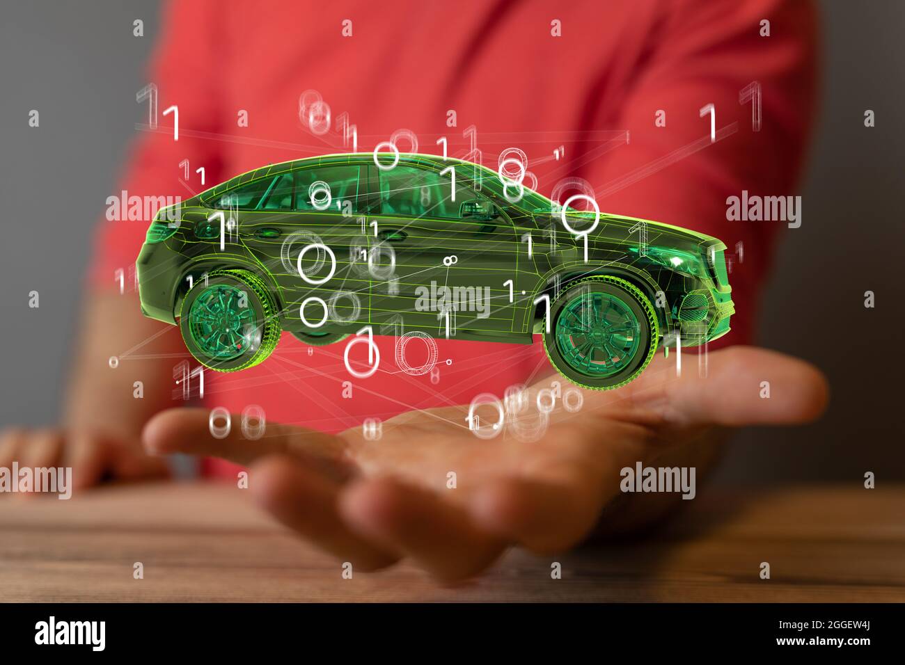 3D rendered hologram of a car with binary numbers hovering over a hand ...