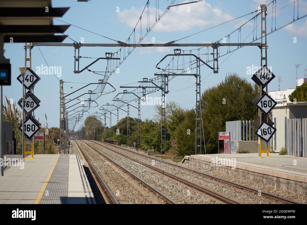 Train stops at the local railway station Stock Photo - Alamy