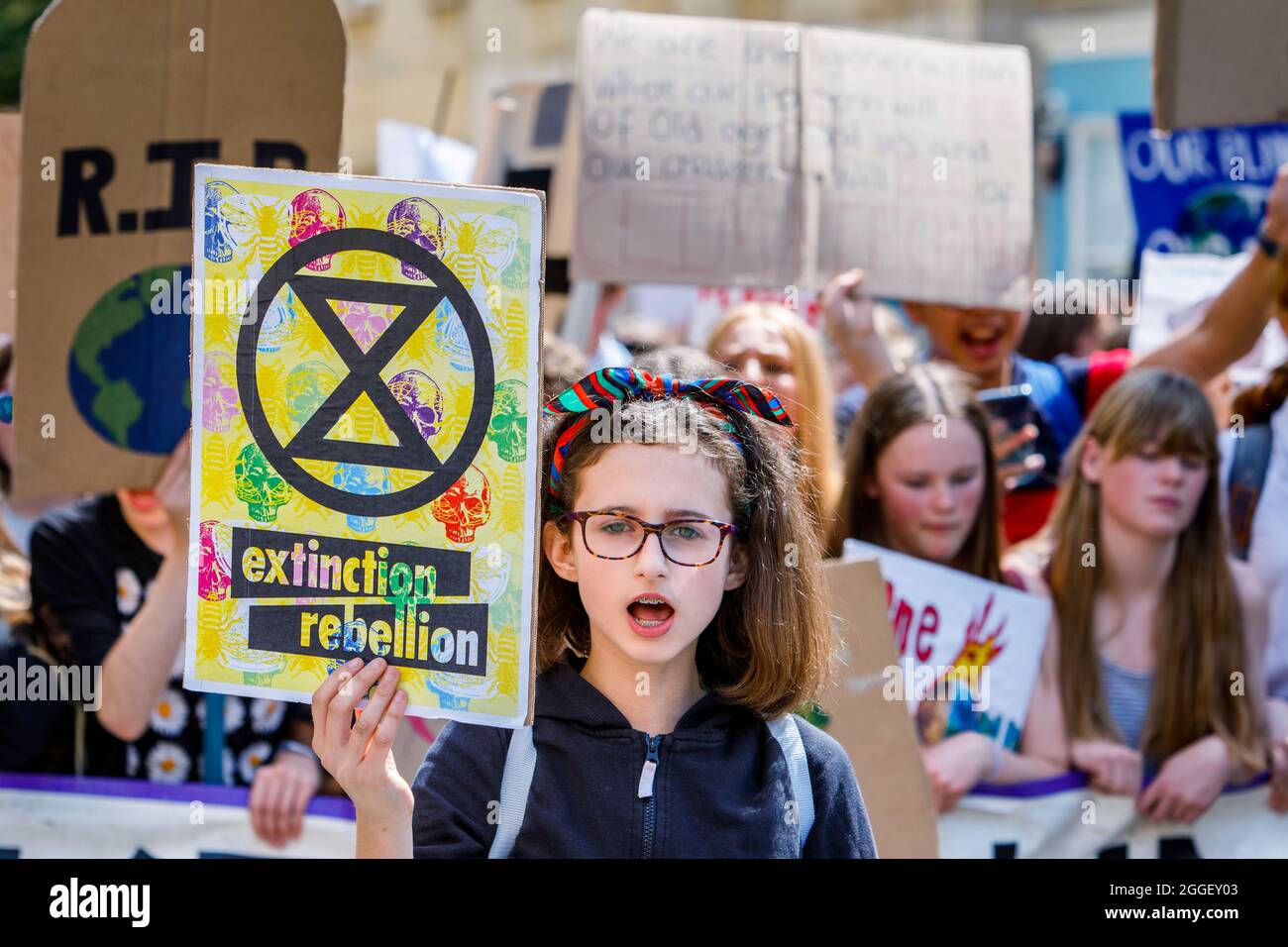 Bath college students and school kids carrying climate change placards ...