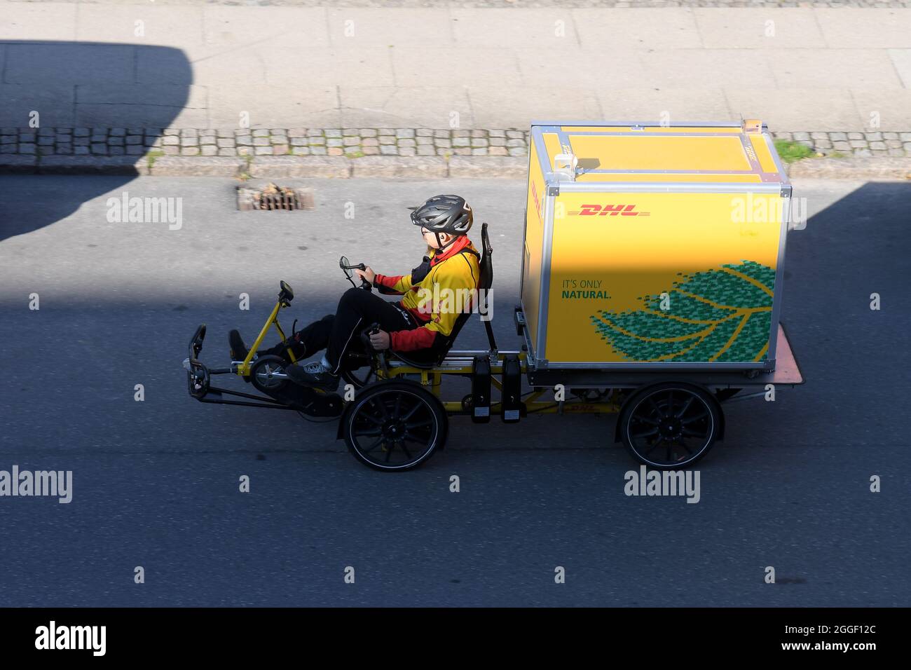 Kastrup/ Denmark./31 August 2021/Deutsche DHL delivery bike riders in ation in Kaastrup Denmark ...