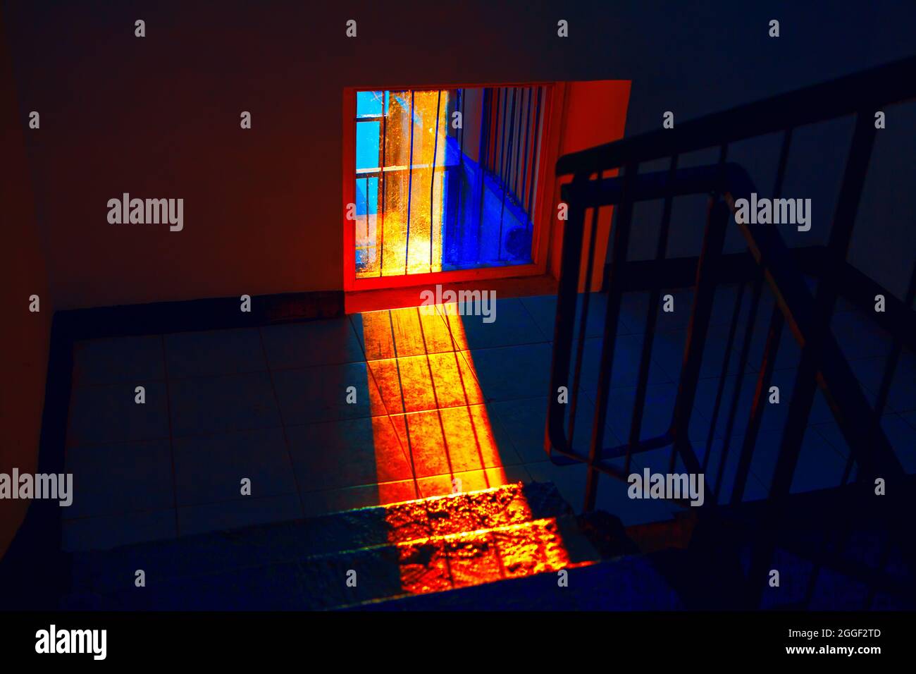 Dark room with Sunlight in Window . interior with stairs and dim light ...
