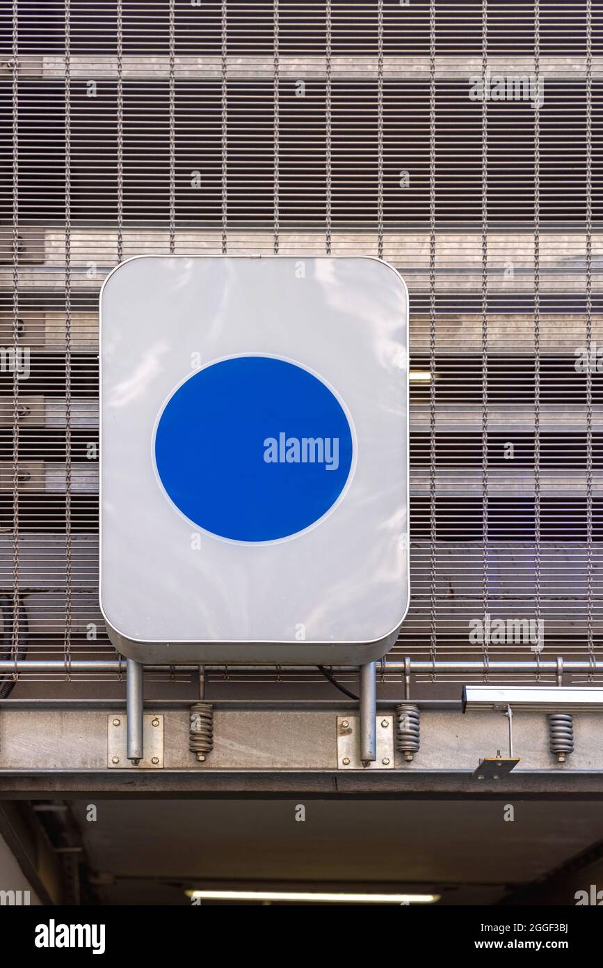 Blue Dot Illuminated Sign at Metal Building Structure Stock Photo - Alamy