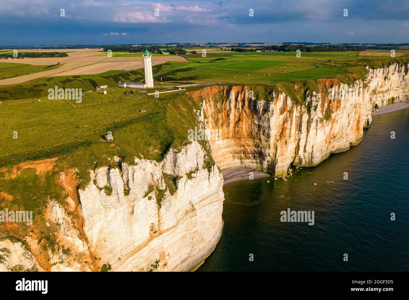Aerial shot of Antifer lighthouse and limestone cliffs in Normandy ...