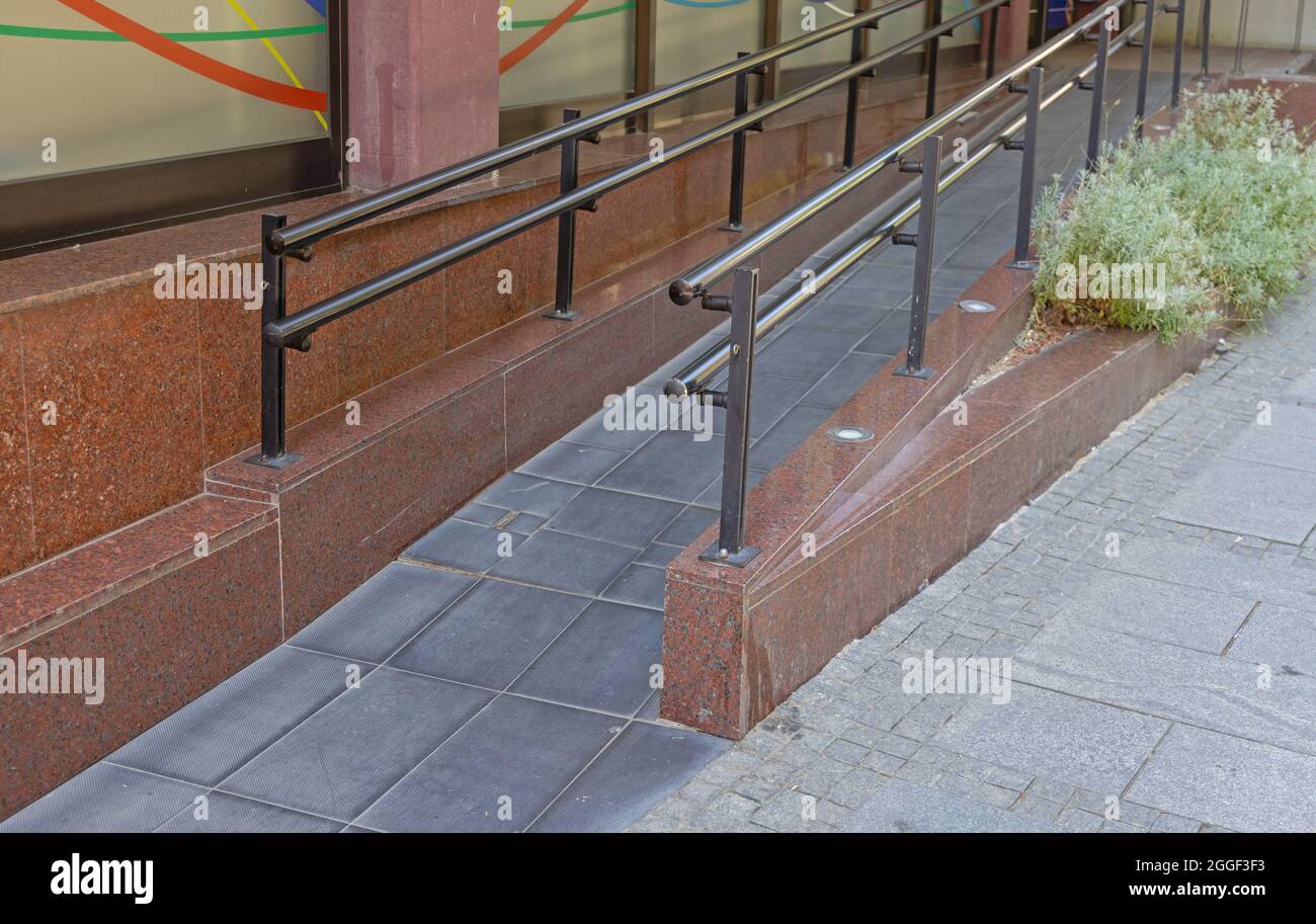 Long Ramp for Wheelchair User Safe Access Way Stock Photo - Alamy