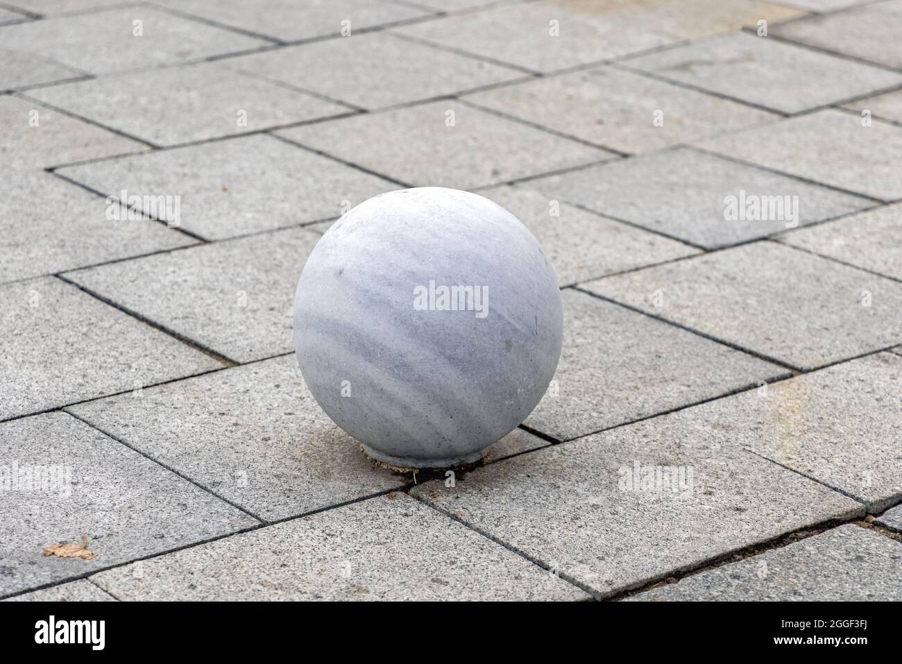 Marble Ball at Street Pavement City Decor Stock Photo - Alamy