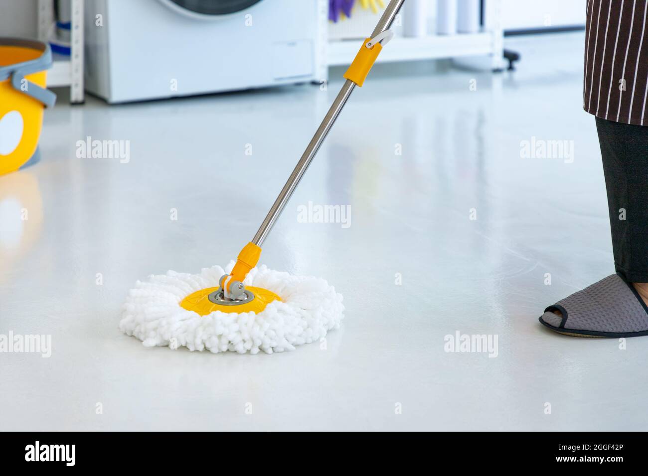 Woman using old washing machine hi-res stock photography and images - Alamy