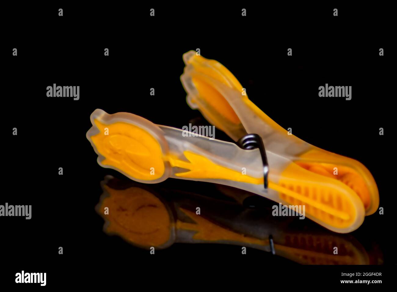 Household : The orange clothes peg Stock Photo - Alamy