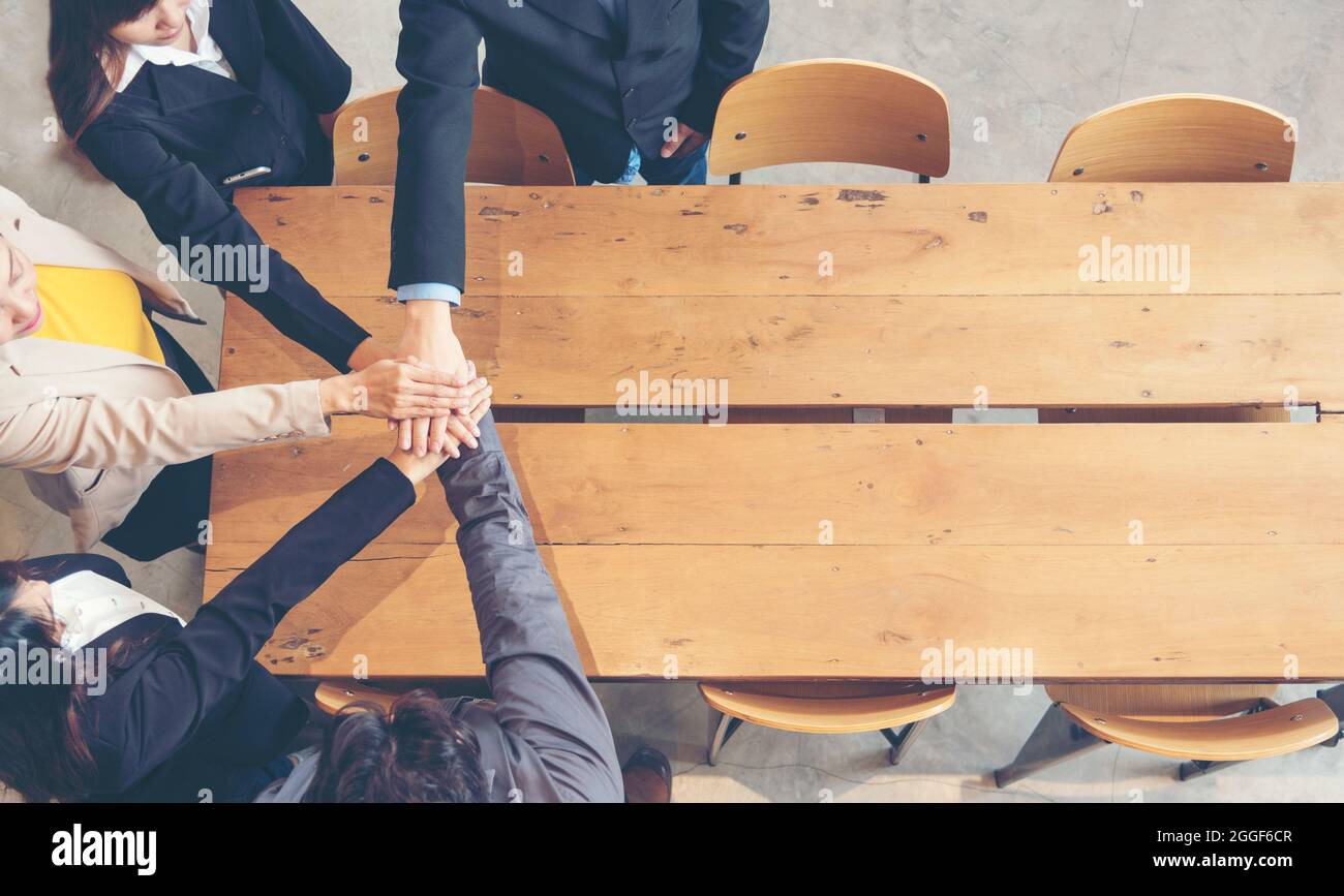 Teamwork Marketing Team Collaborate in office. Group of people holding ...