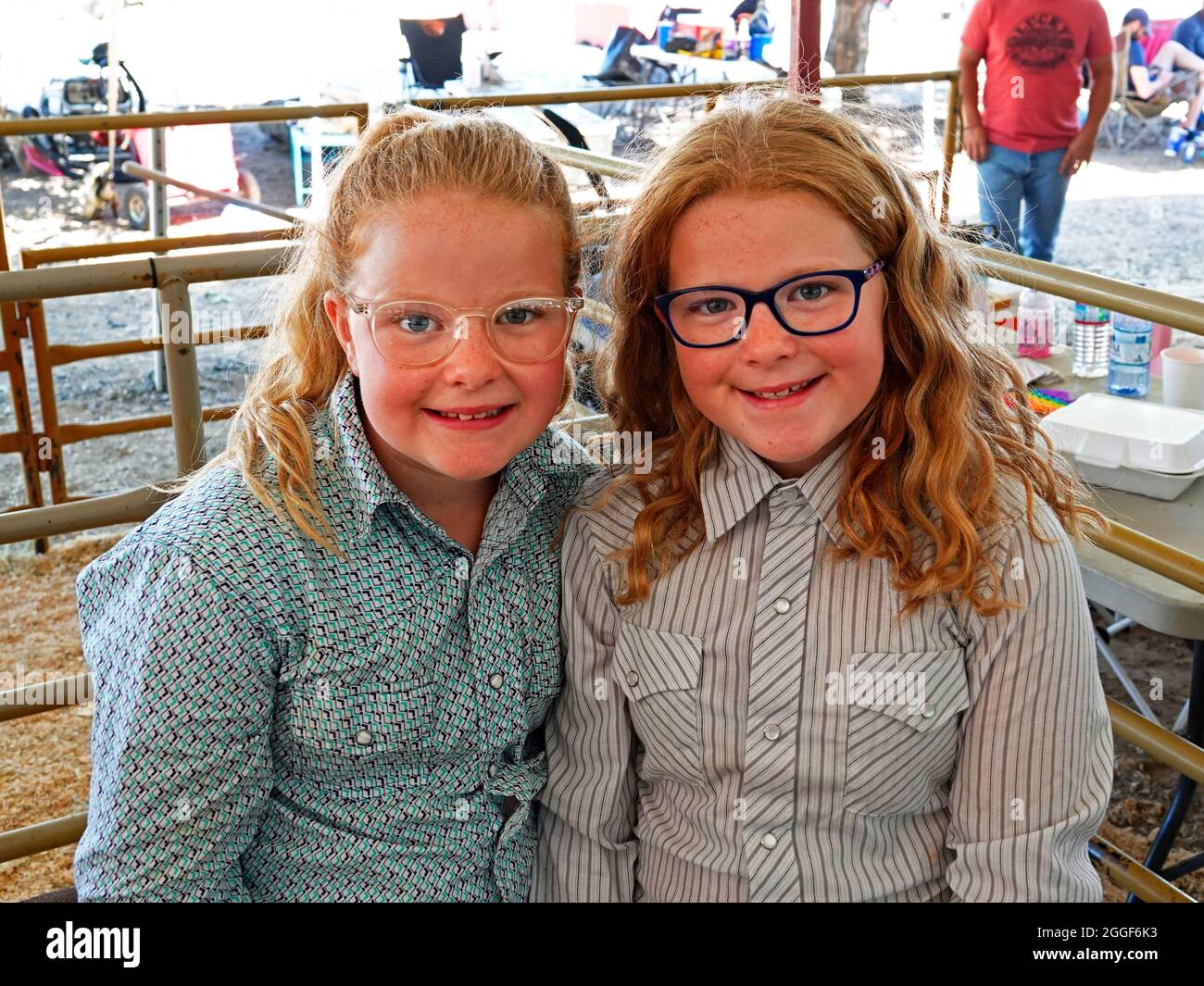A set of identical twins at a county fair in central Oregon Stock Photo ...
