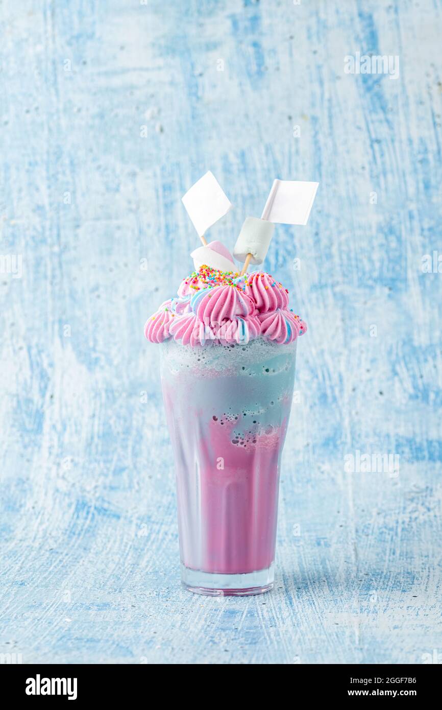 Glass pink milkshake decorated candy hi-res stock photography and ...