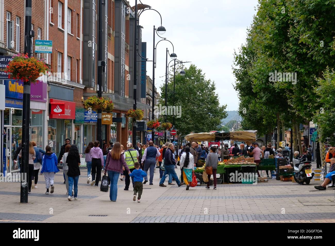 Bexleyheath Kent England 08.31.21 people mingling in an outdoor ...