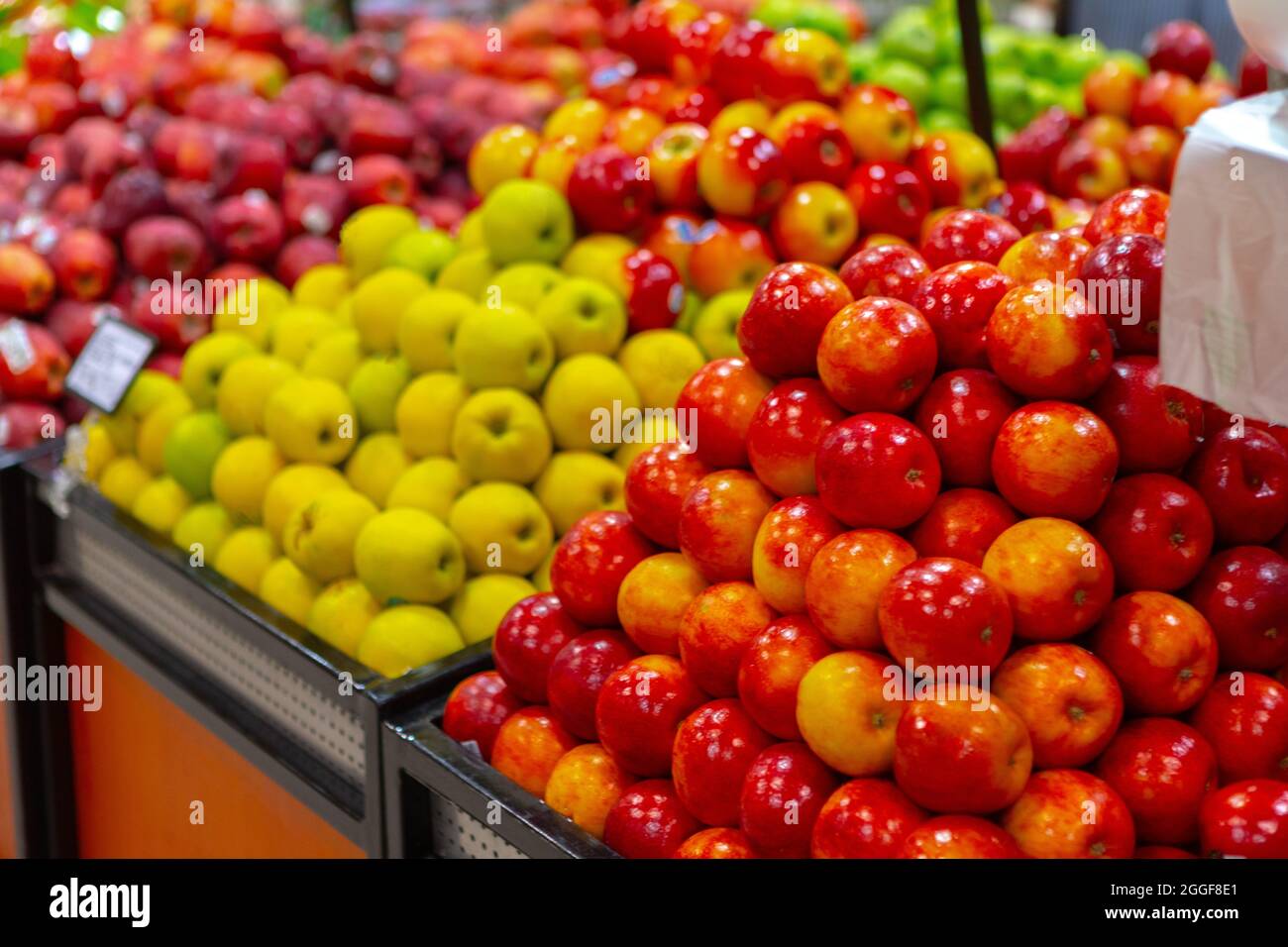 Assortment of fresh fruits on counter in supermarket Stock Photo - Alamy