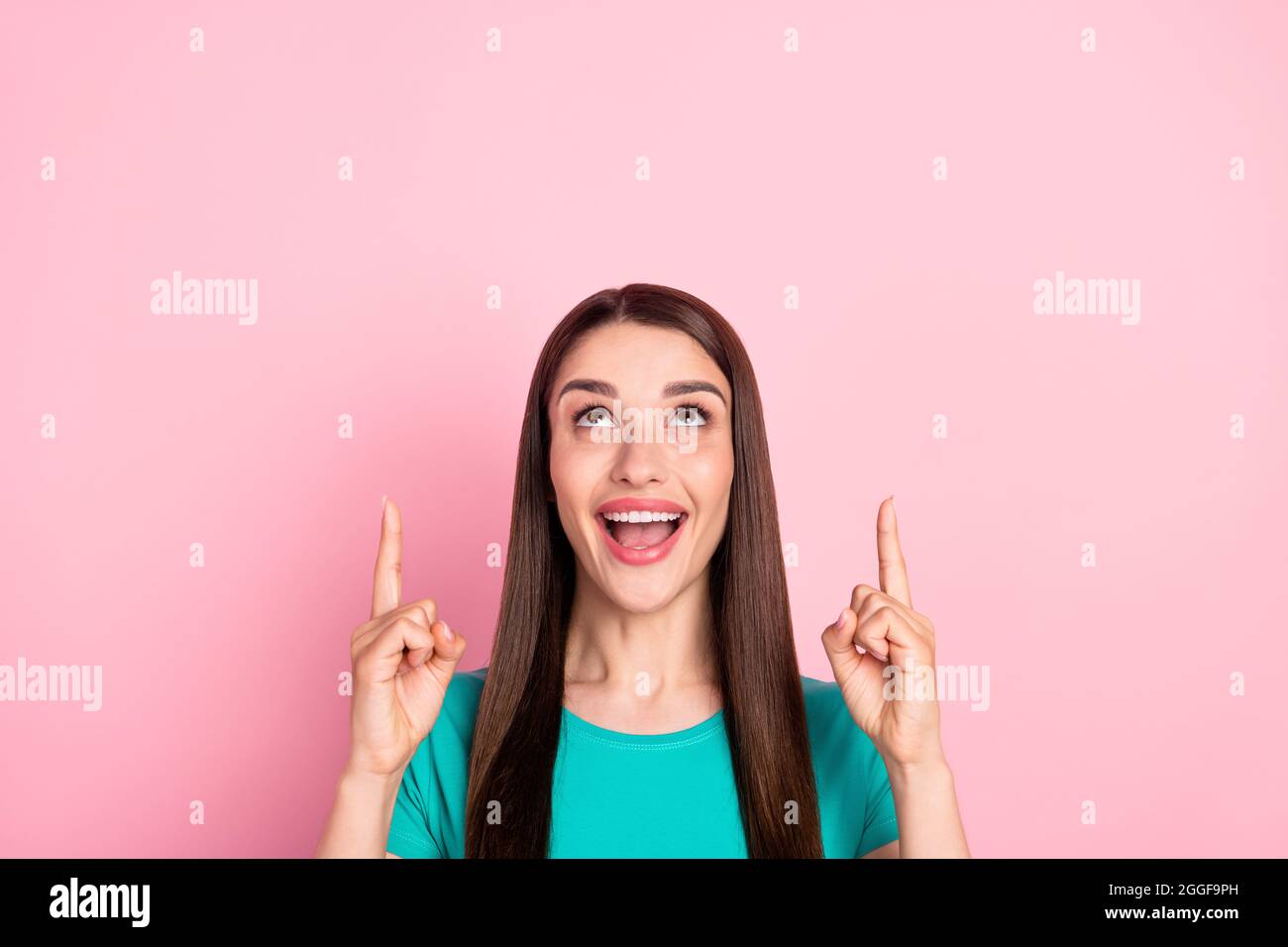 Photo of young cheerful woman happy positive smile point fingers empty ...