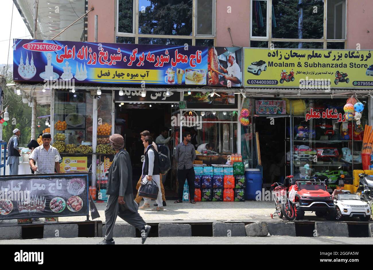 Kabul, Afghanistan. 31st Aug, 2021. People walk on the street in Kabul ...
