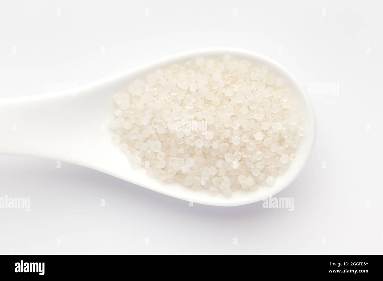 Macro Close up of organic white sago or sabudana small size on a white ...