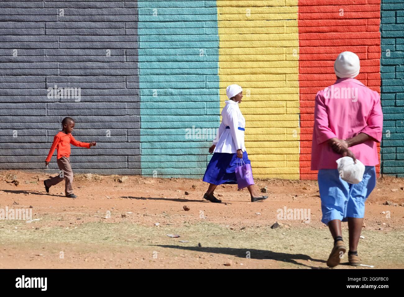 JOHANNESBURG, SOUTH AFRICA - Aug 10, 2021: Several pedestrians walking ...
