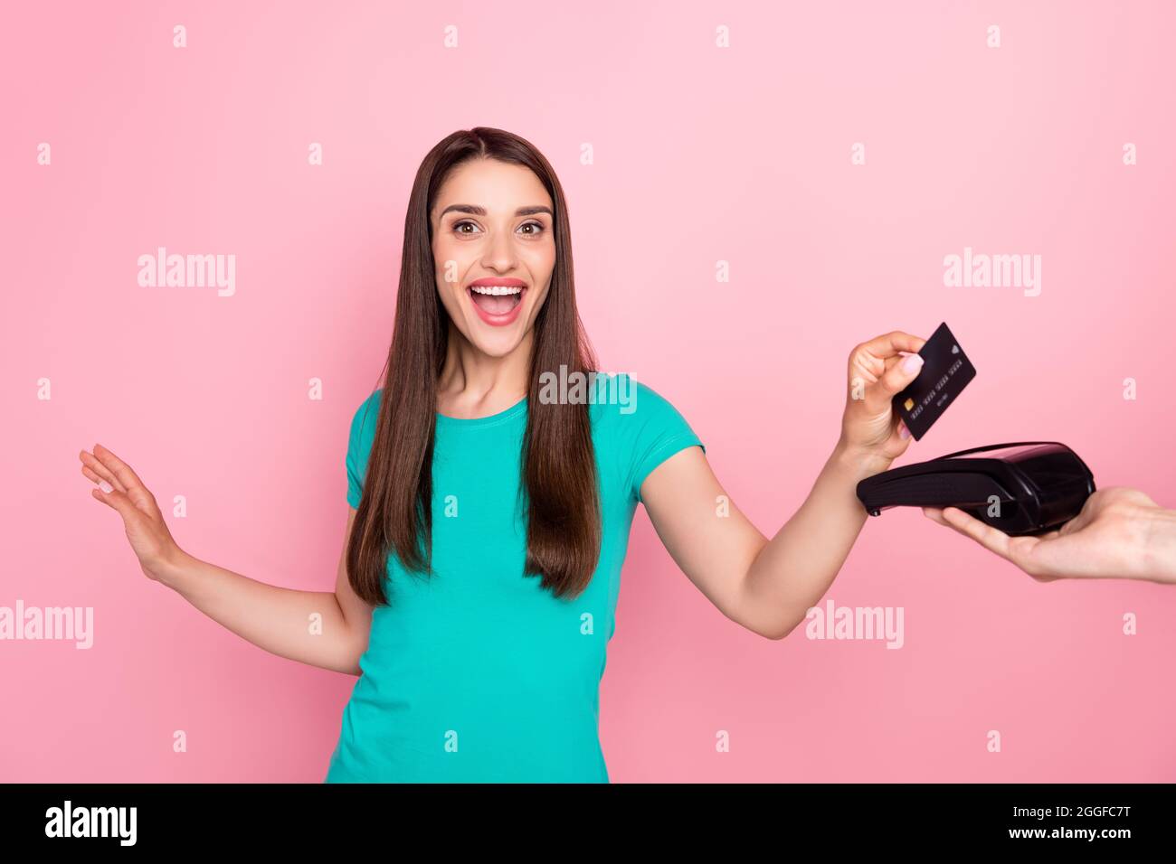 Photo of young woman happy positive smile buy pay credit card transaction cashless terminal ...