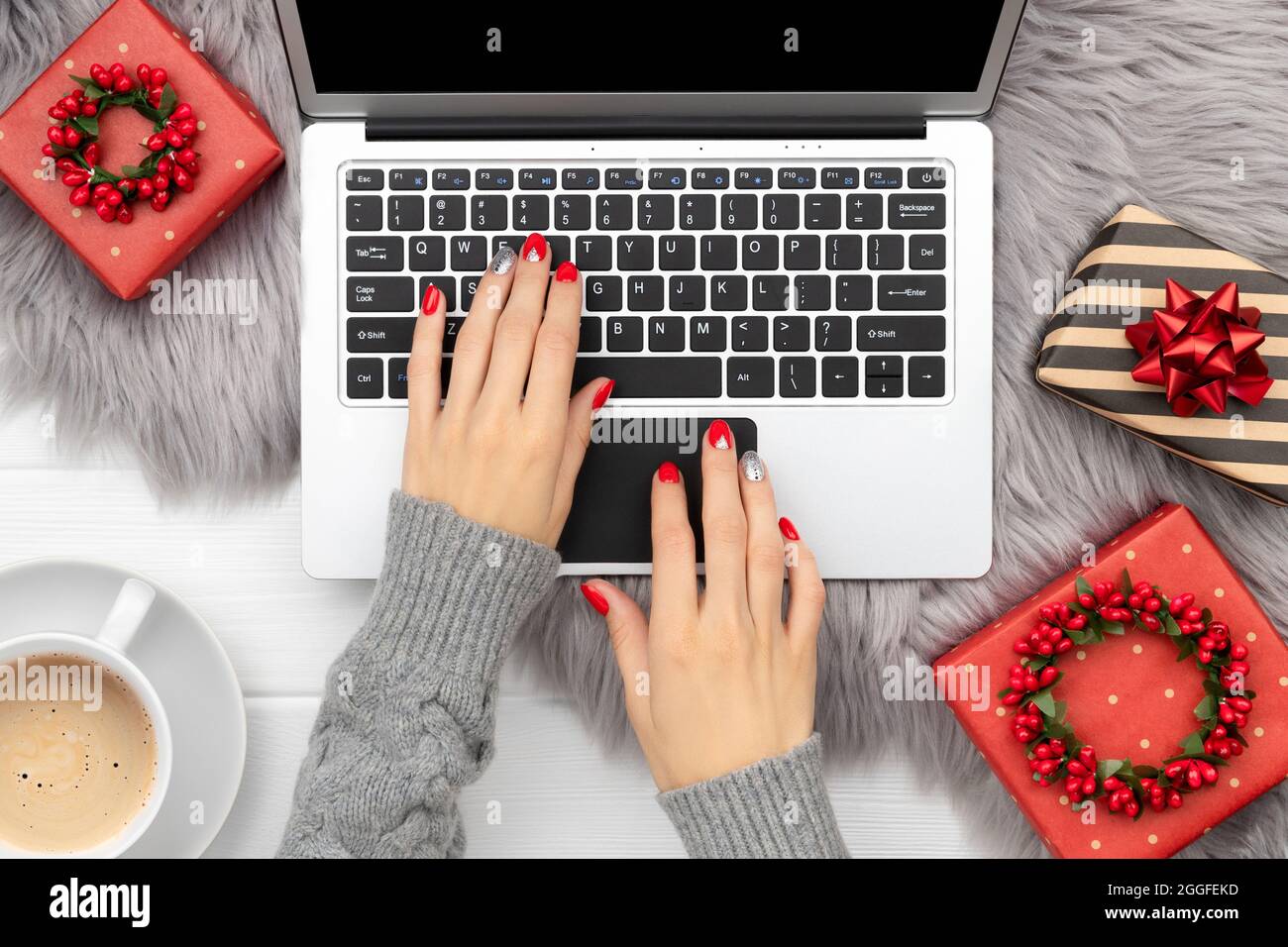 Womans hands with trendy red manicure typing on the keyboard Stock ...