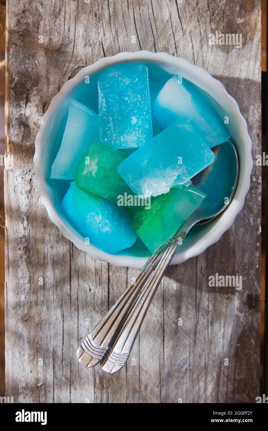 Presentation of the different colors of ice cubes Stock Photo - Alamy