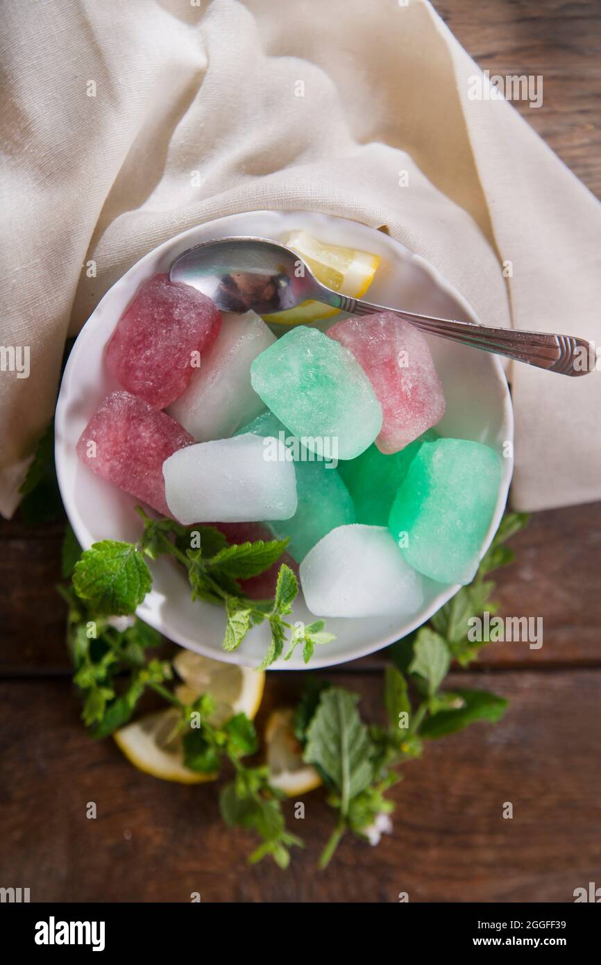 Presentation of the different colors of ice cubes Stock Photo - Alamy