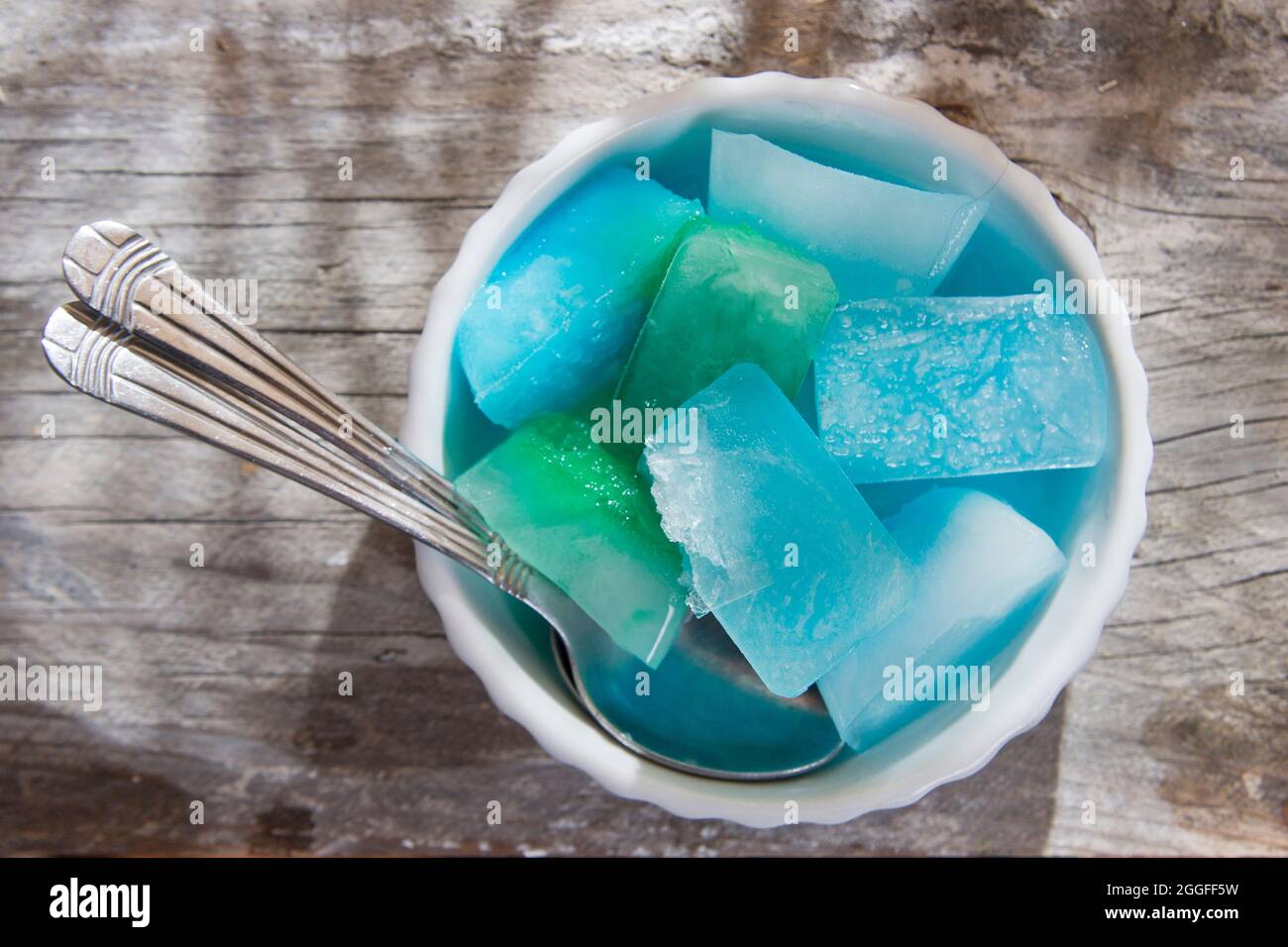 Presentation of the different colors of ice cubes Stock Photo - Alamy