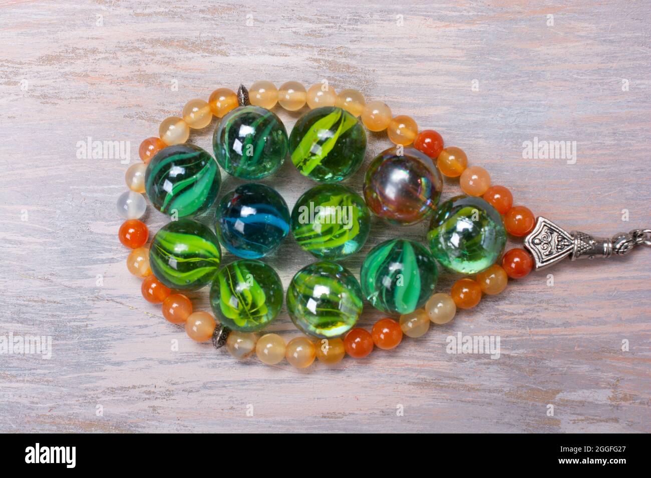 Pile of small balls with beads around Stock Photo - Alamy