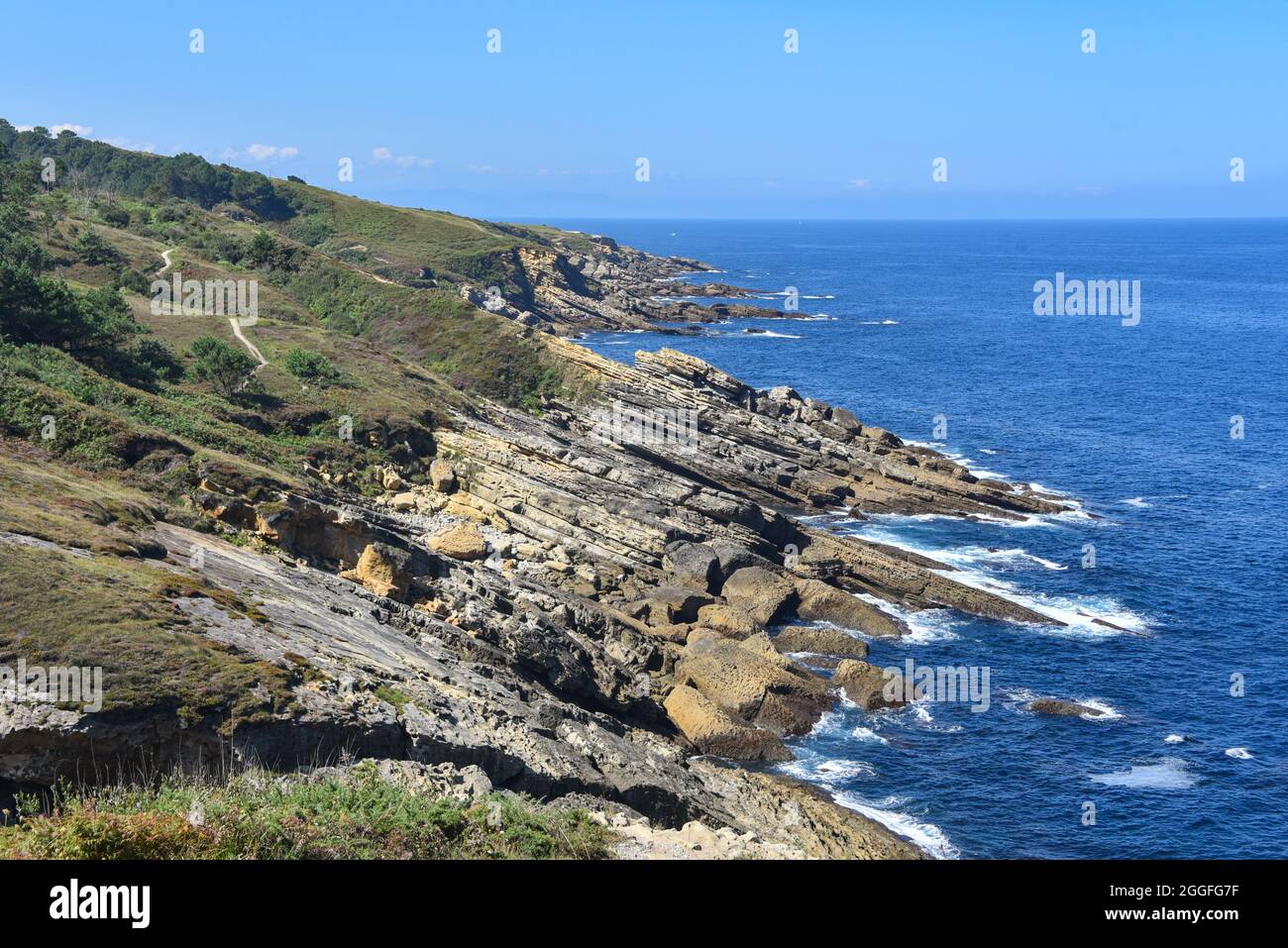 Hiking trails along the rugged Basque coastline near Mount Jaizkibel ...