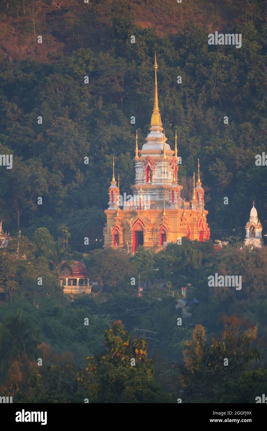 wat on hillside catching the early sun near Chom Thong, Thailand ...