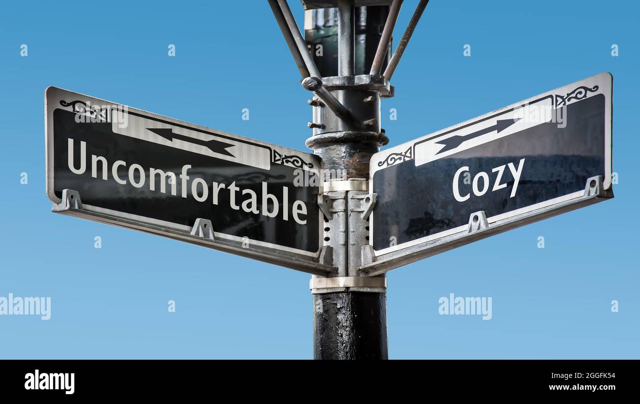 Street Sign the Direction Way to Cozy versus Uncomfortable Stock Photo ...