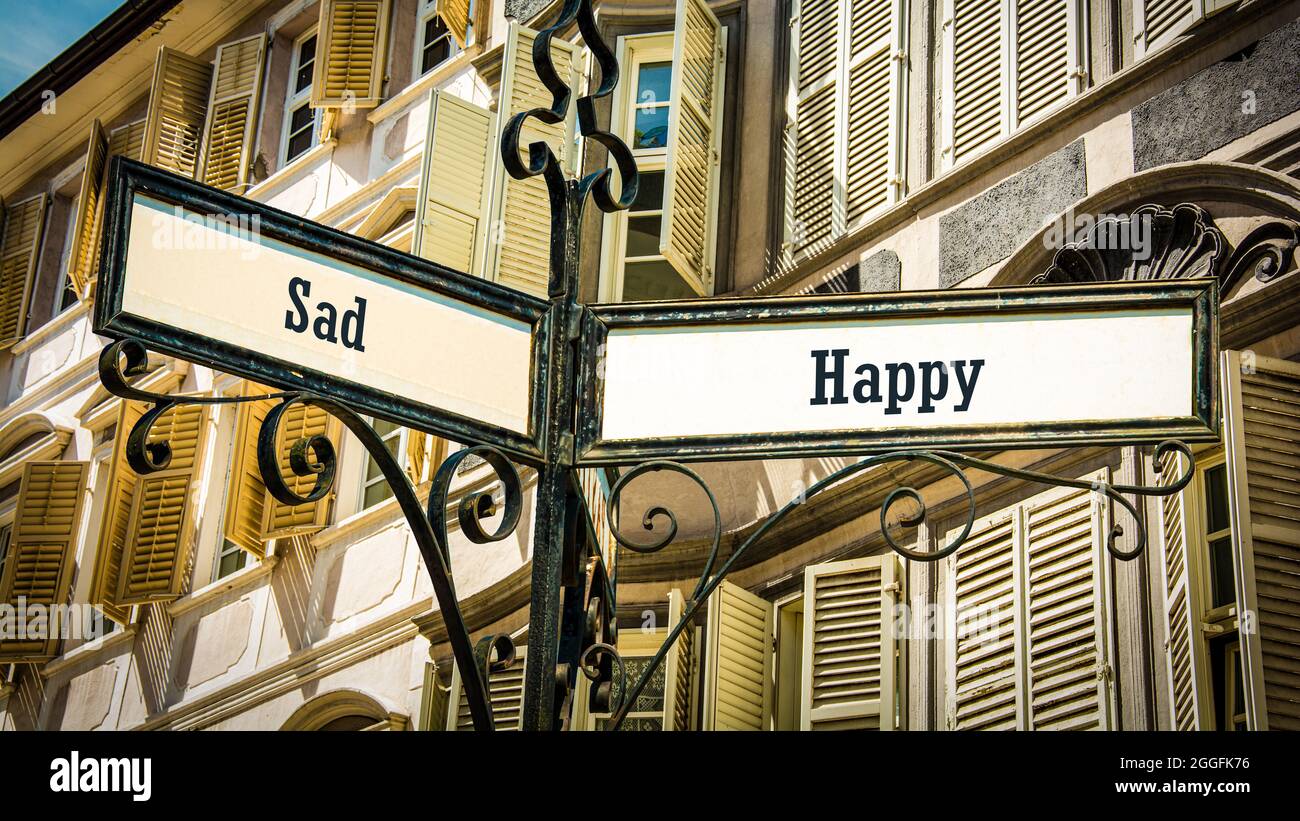 Street Sign the Direction Way to Happy versus Sad Stock Photo - Alamy