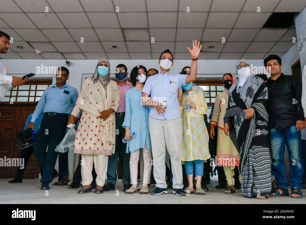 Bangladeshi American Sharif Imran and his two Japanese daughters coming ...