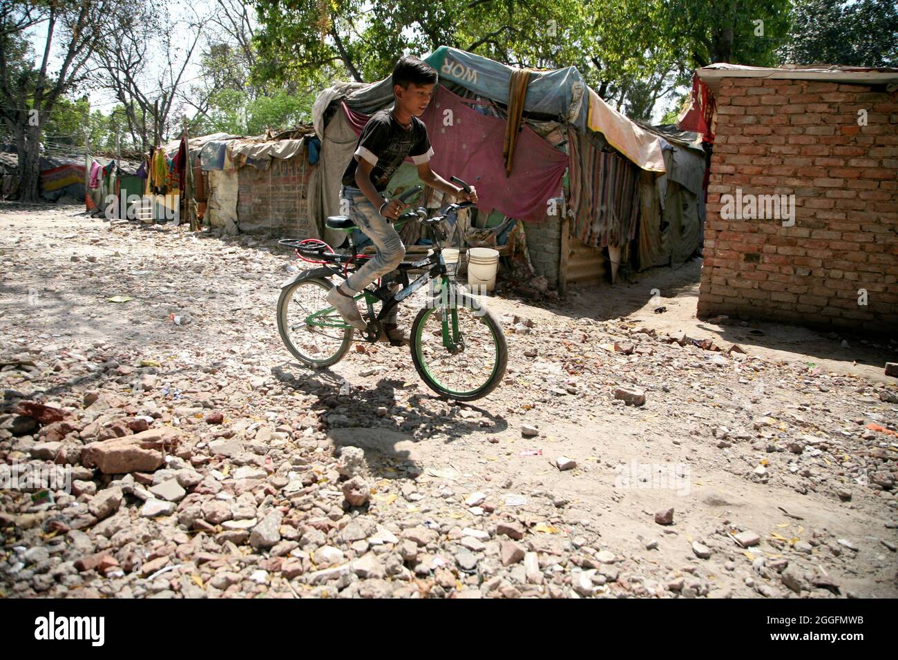 A general view of a slum area near Shakurbasti Railway station in New ...
