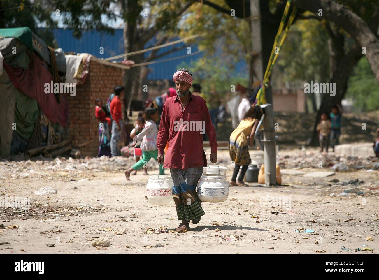 A general view of a slum area near Shakurbasti Railway station in New ...